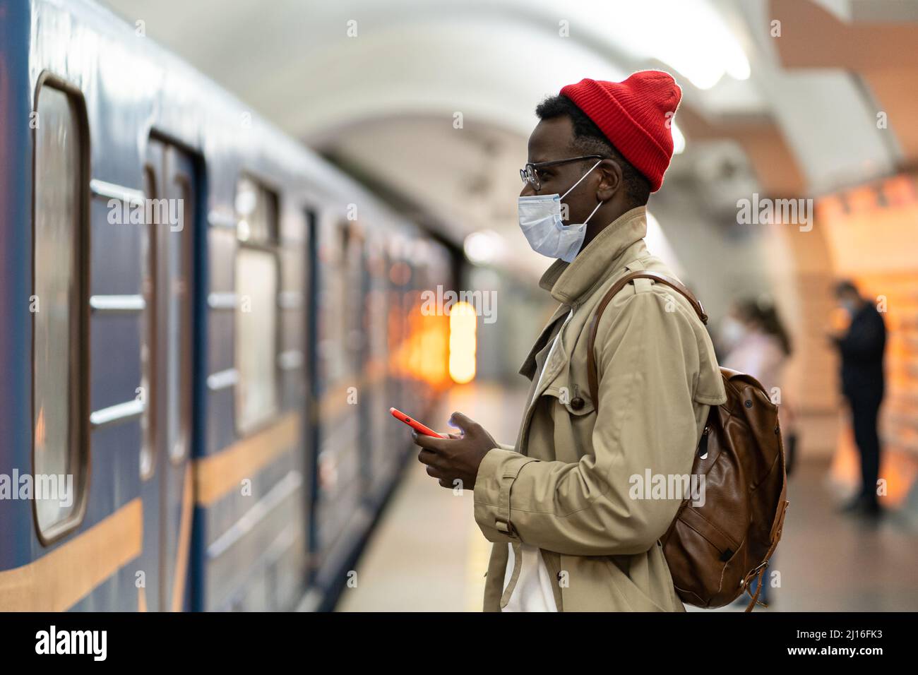 Train station black man hi-res stock photography and images - Alamy