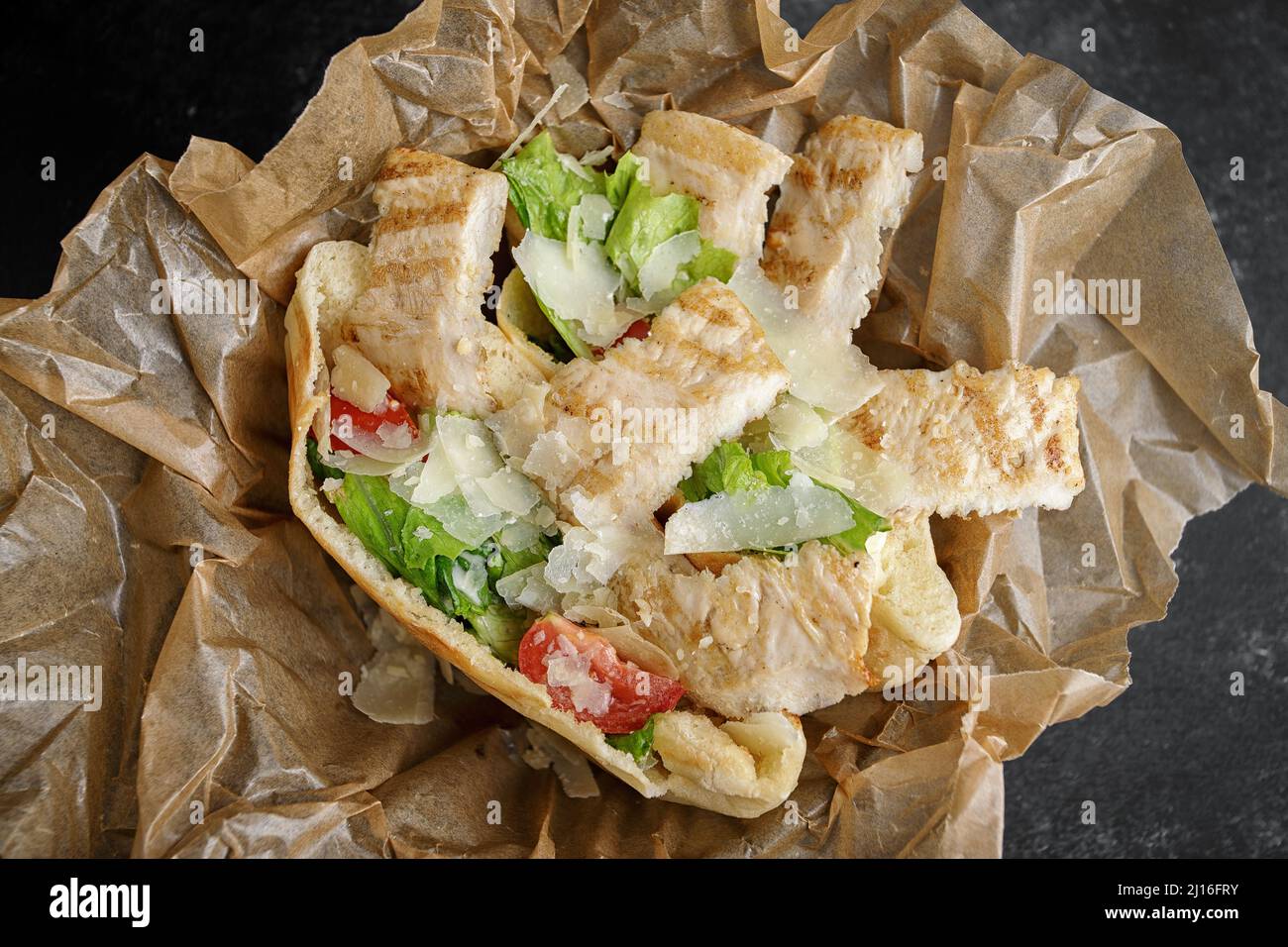 Gyros, shawarma with meat and herbs, on craft paper Stock Photo - Alamy