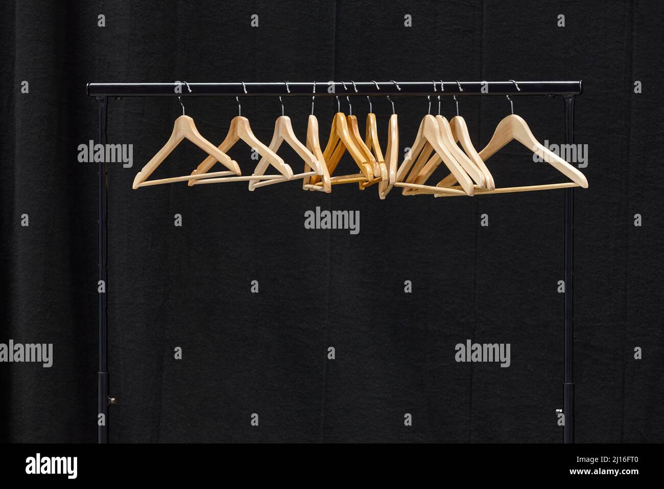 Clothes rack with hangers on an empty dressing room. Showroom Stock ...