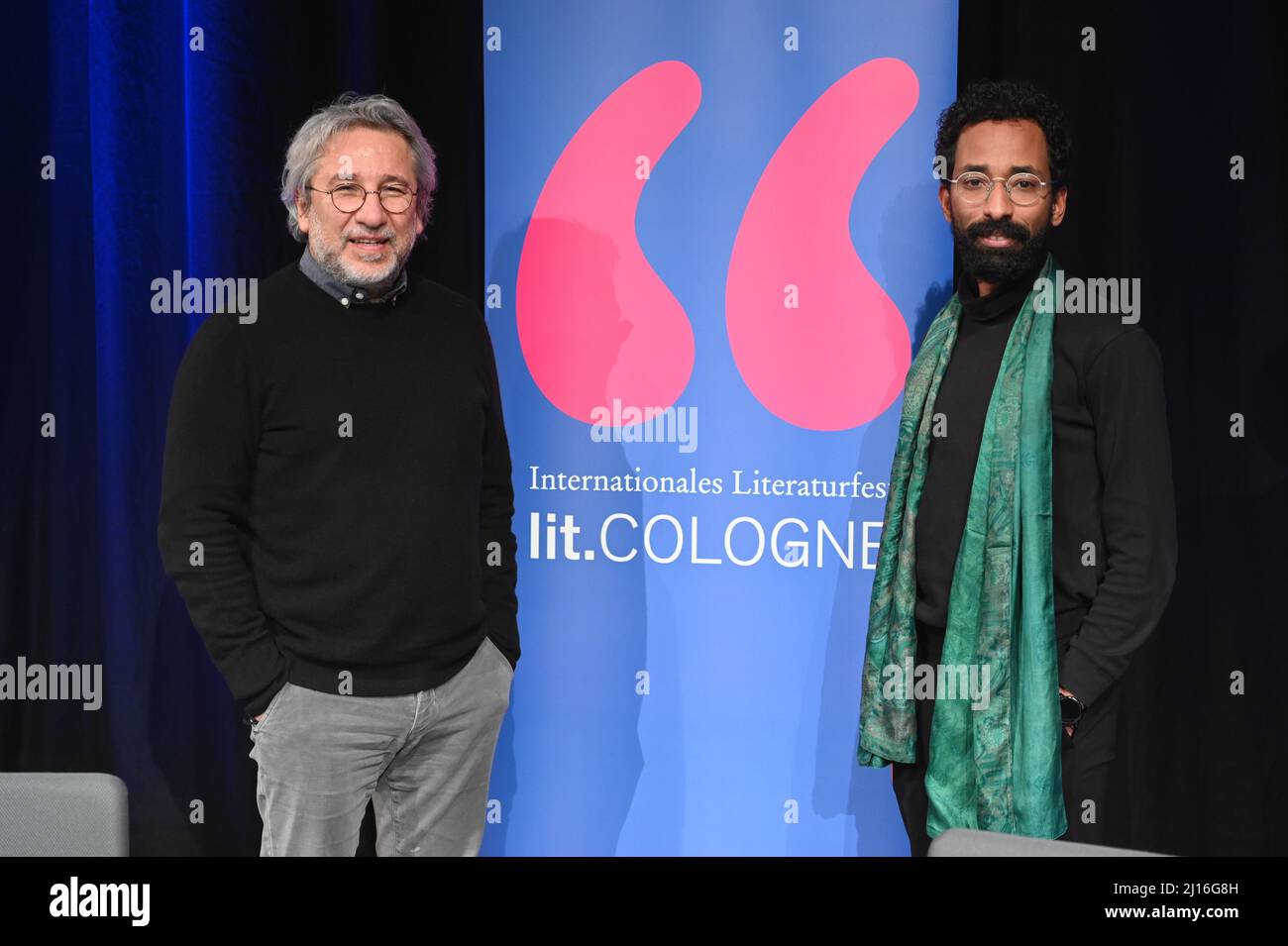 Cologne, Germany. 22nd Mar, 2022. Turkish journalist Can Dündar (l) and ...