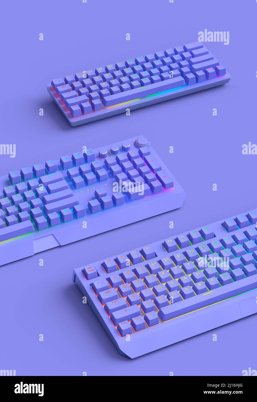 Top view of gamer workspace and gear like keyboards on purple ...