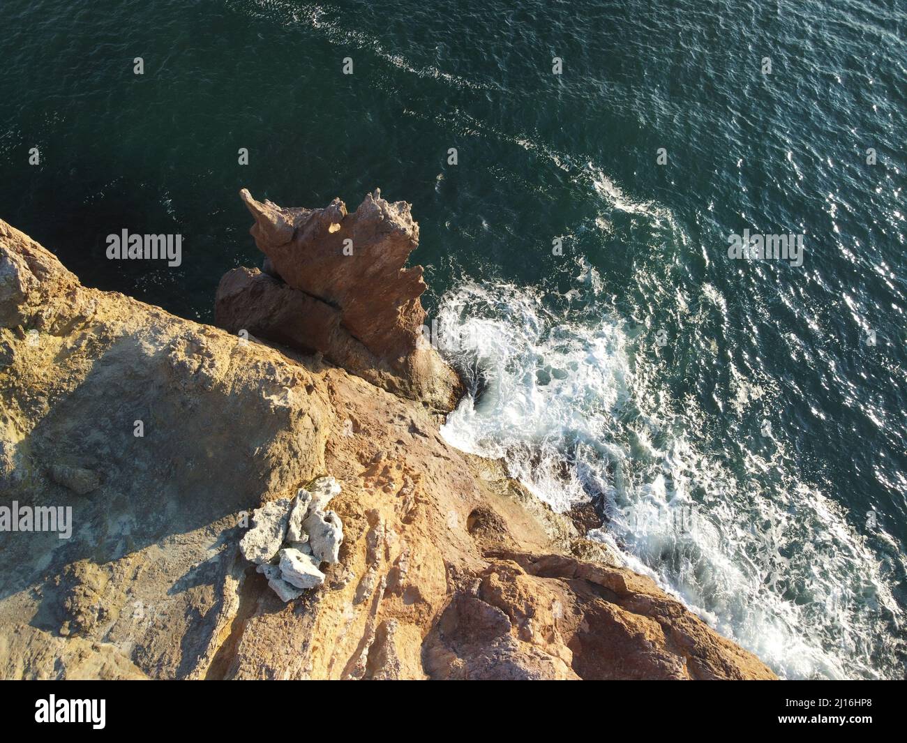 Dragon head arise from the water - The rock or lava formation with the ...