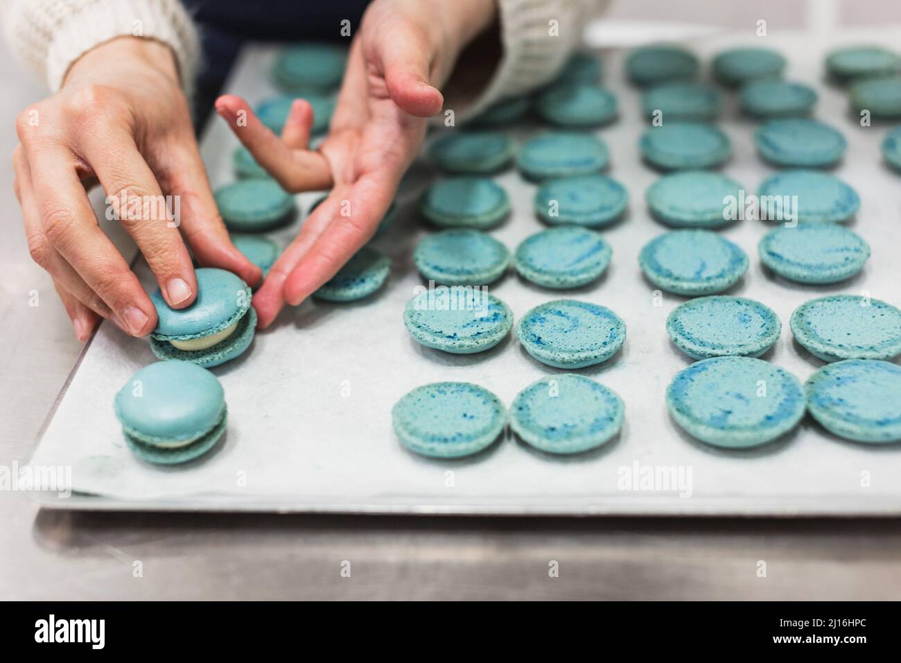 Pastry chef making macarons in pastry shop Stock Photo - Alamy