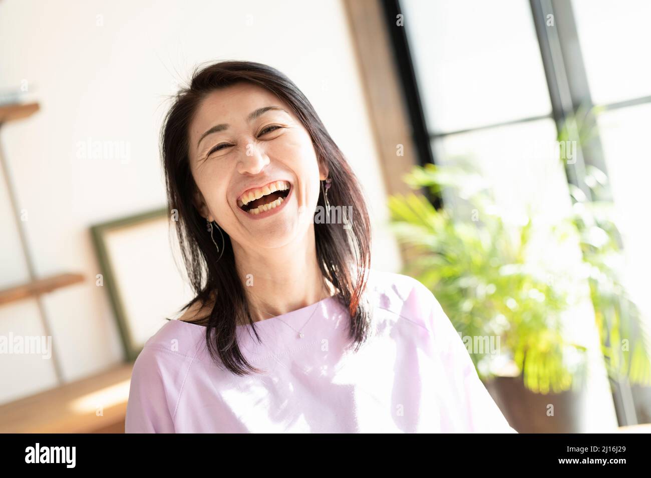 Portrait of 50s Woman Stock Photo - Alamy