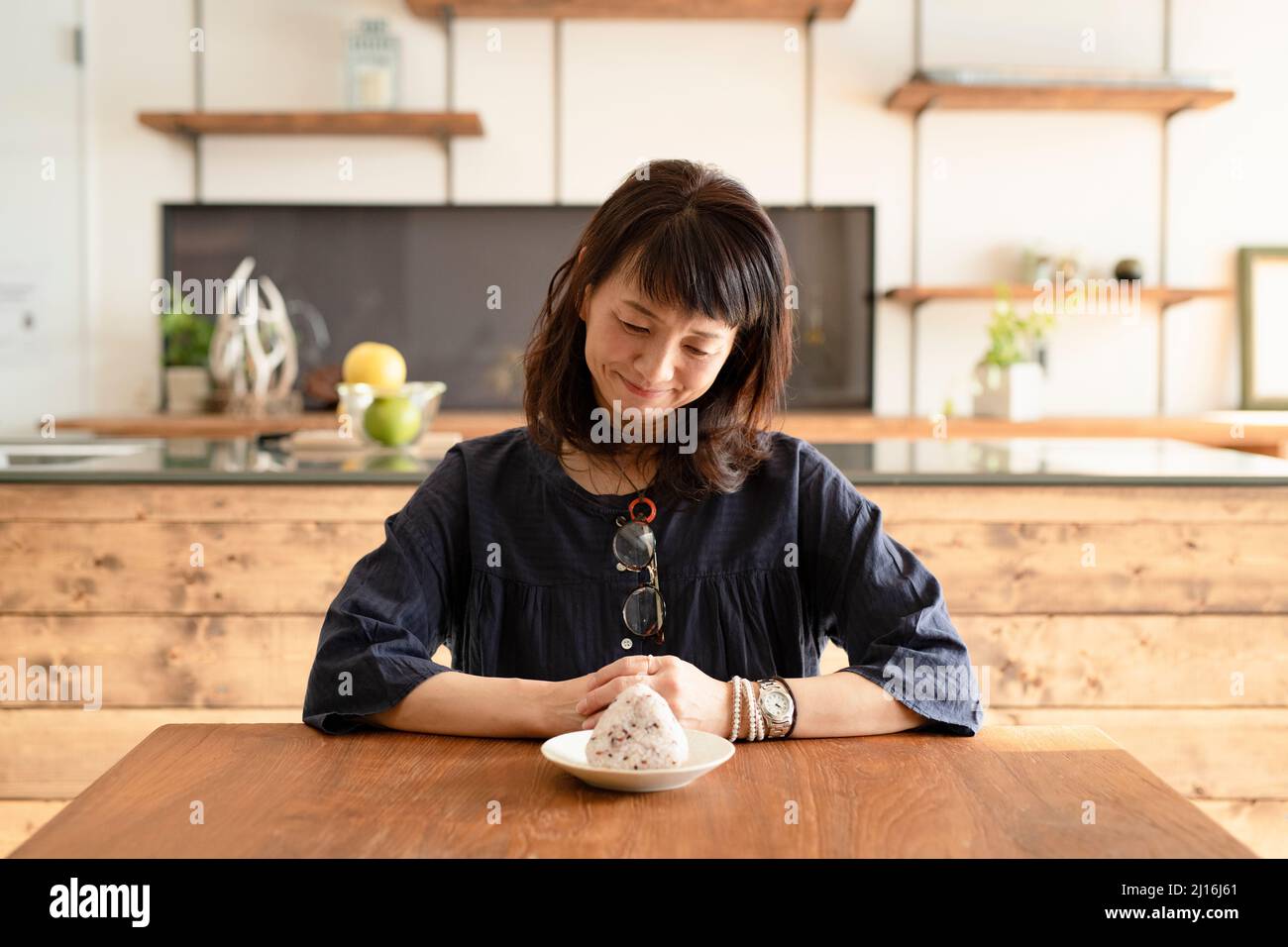 Multigrain Rice Ball and Woman Stock Photo - Alamy