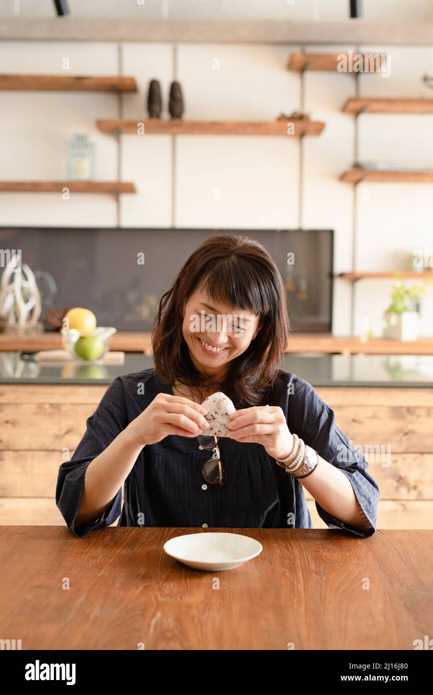 Multigrain Rice Ball and Woman Stock Photo - Alamy