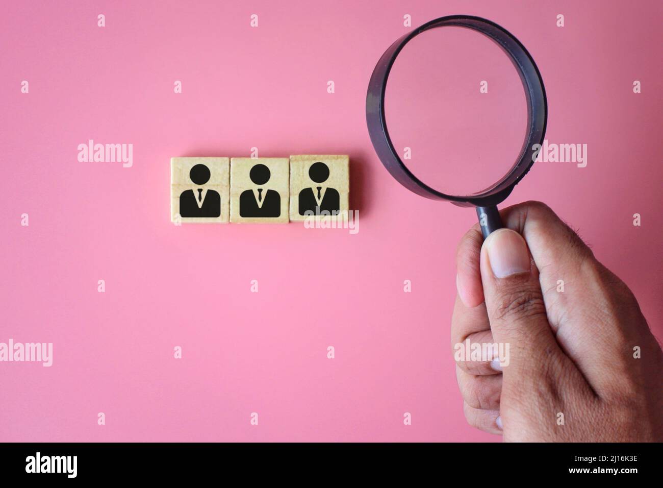 Recruitment, employment and hiring concept. Hand holding magnifying ...