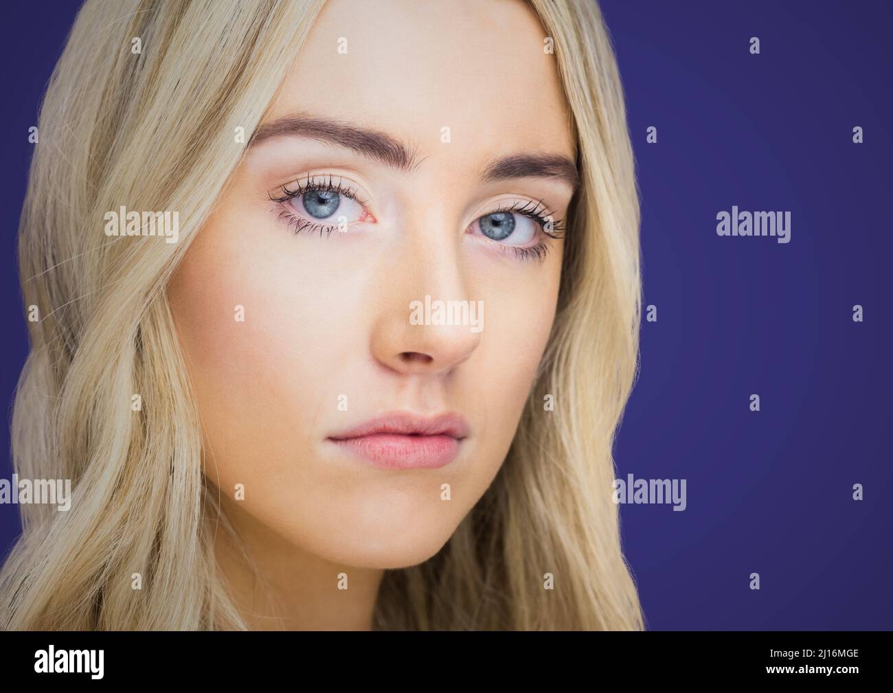 Portrait of adult against blue background hi-res stock photography and ...