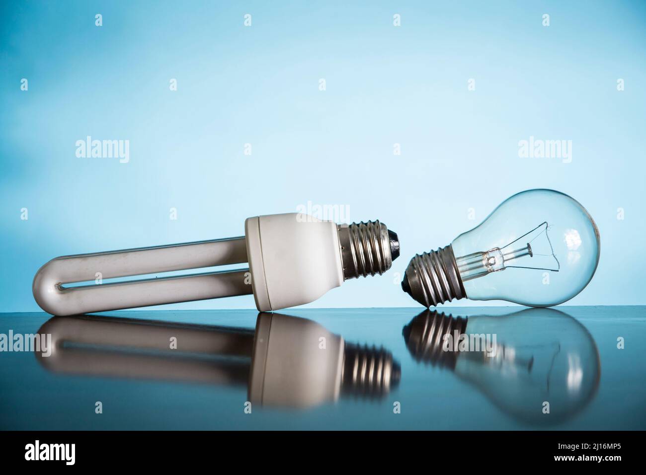 Light bulb with blue background hi-res stock photography and images - Alamy