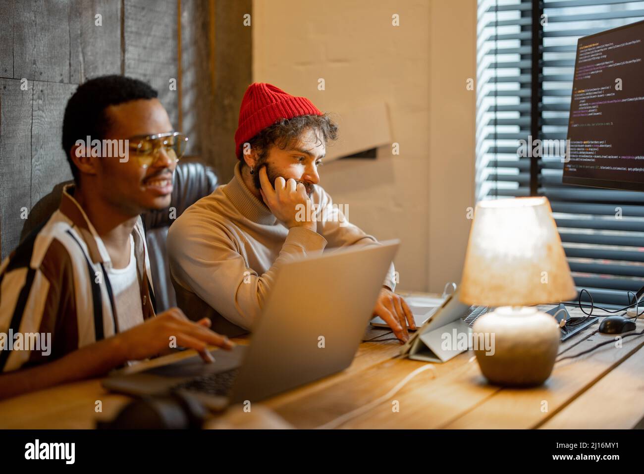 Office desk two laptop hi-res stock photography and images - Alamy