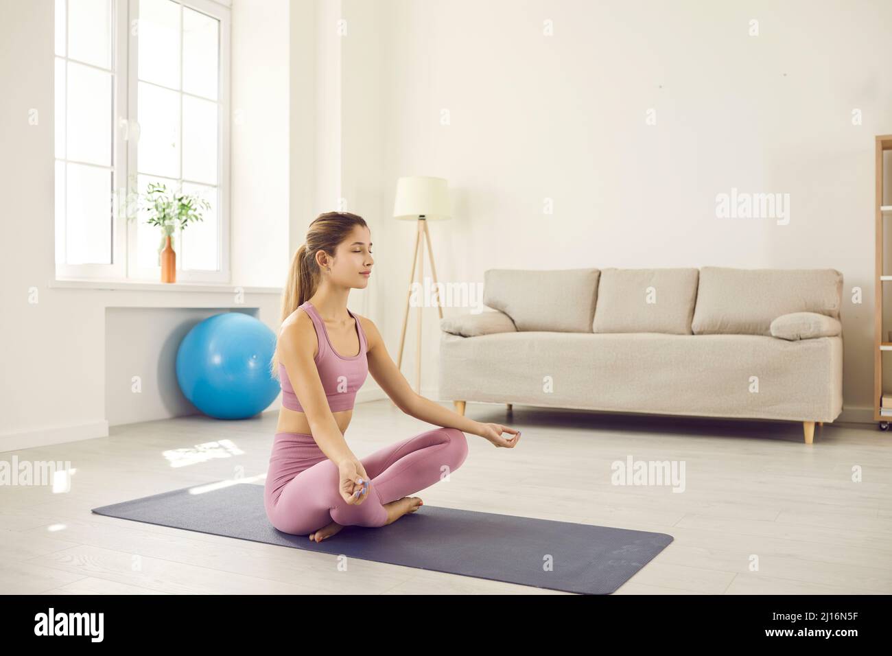 Young woman calm wellness hi-res stock photography and images - Alamy