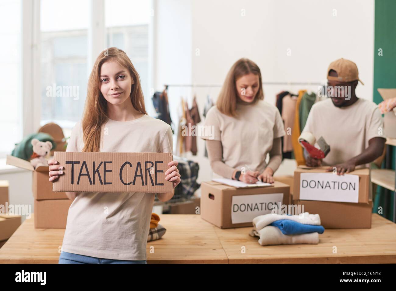 Group of active multi-ethnic people working together in clothes ...