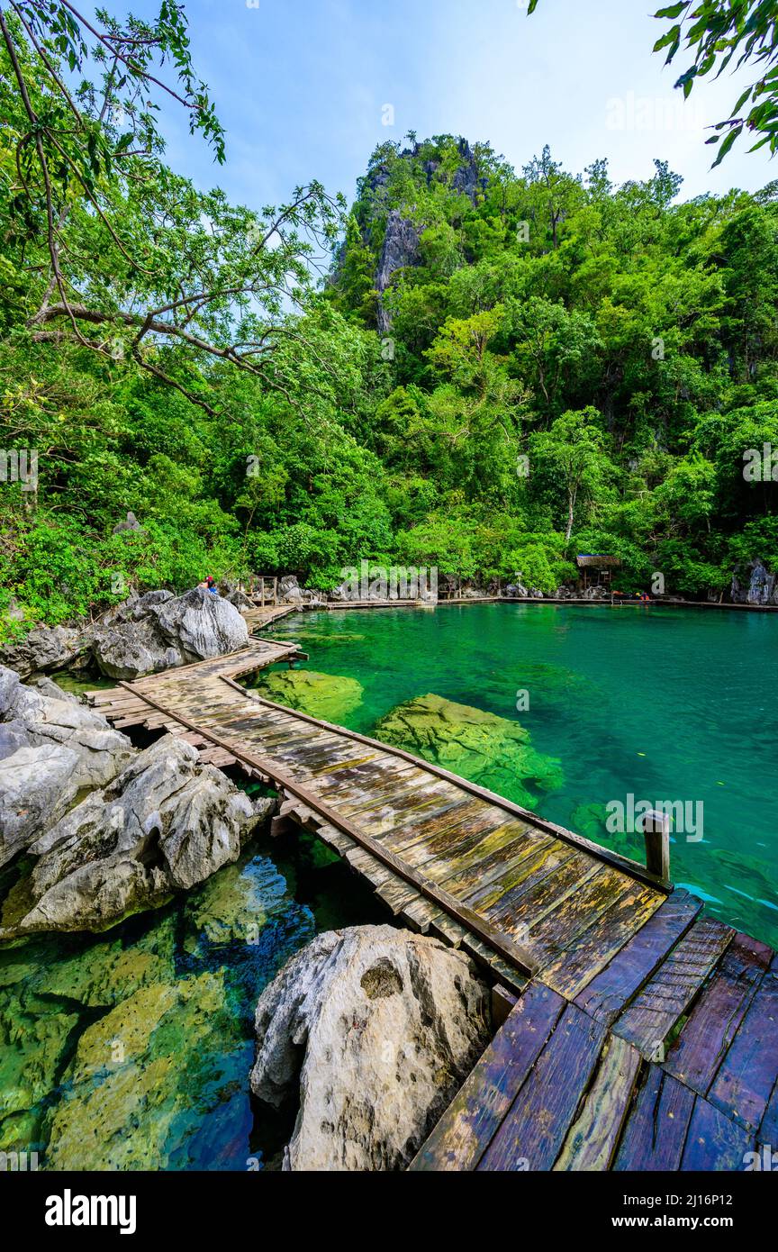Kayangan Lake - Blue crystal water in paradise lagoon - walkway on ...