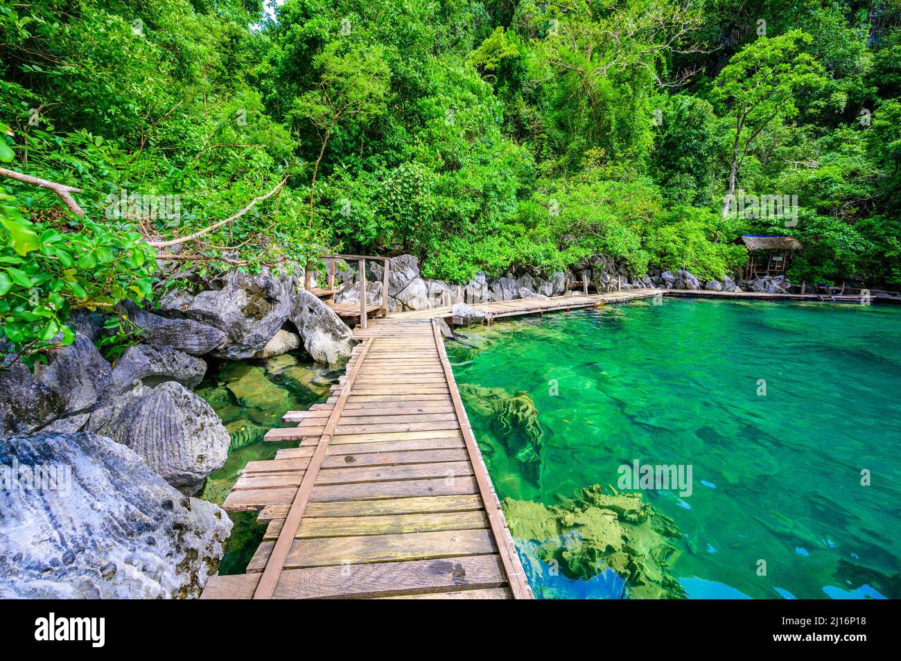 Kayangan Lake - Blue crystal water in paradise lagoon - walkway on ...