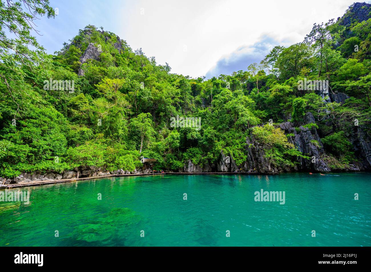Kayangan Lake - Blue crystal water in paradise lagoon - walkway on ...