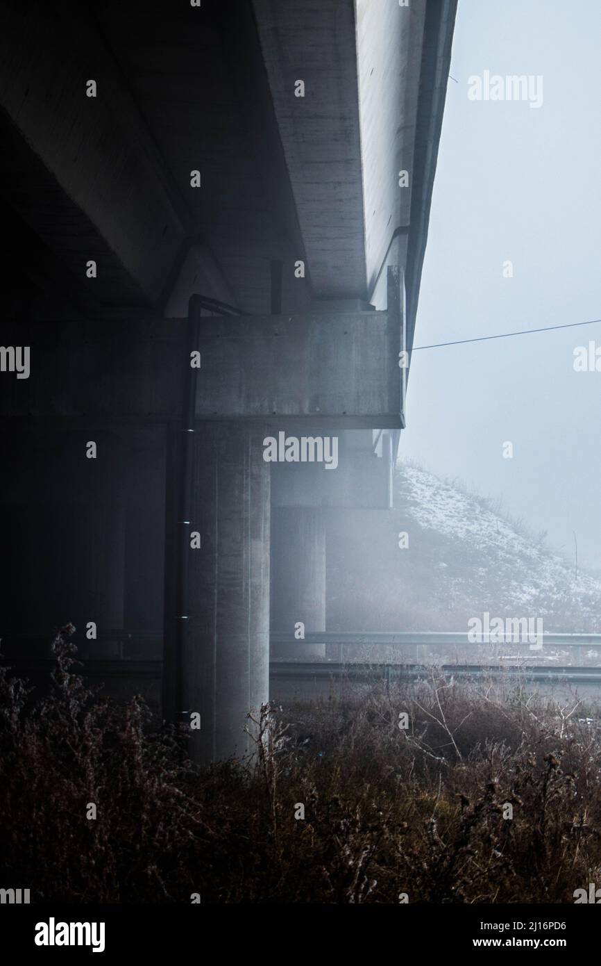 Fog under a bridge Stock Photo - Alamy