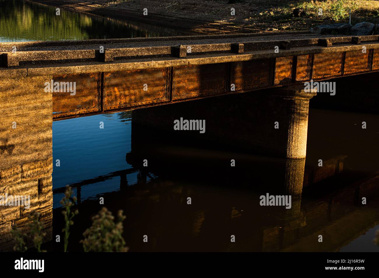 Rusty old bridge over water hi-res stock photography and images - Alamy