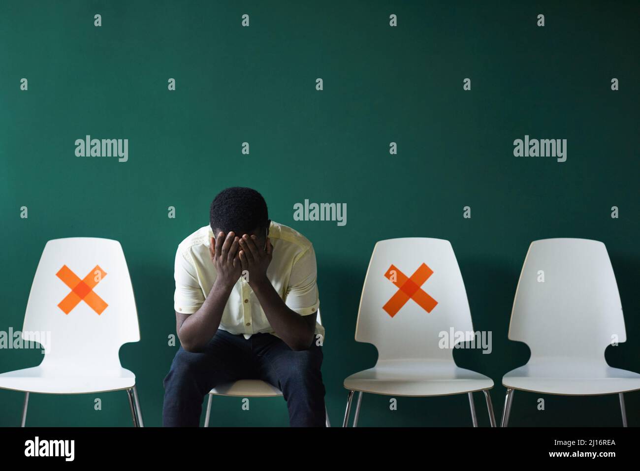 Despair man chair hi-res stock photography and images - Alamy