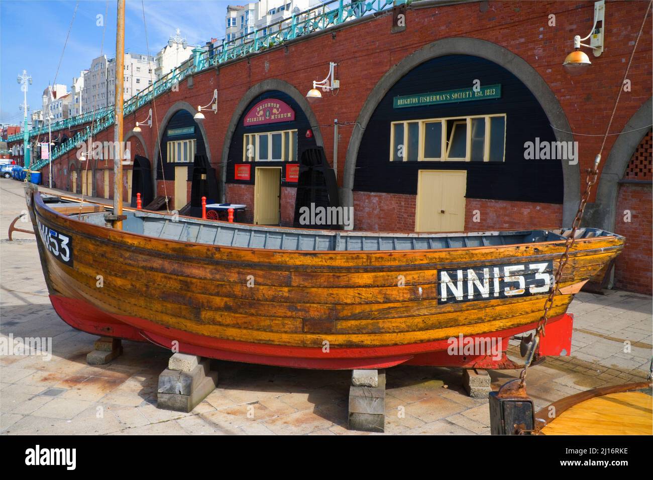 old boats on the beach outside brighton fishing museum Stock Photo - Alamy