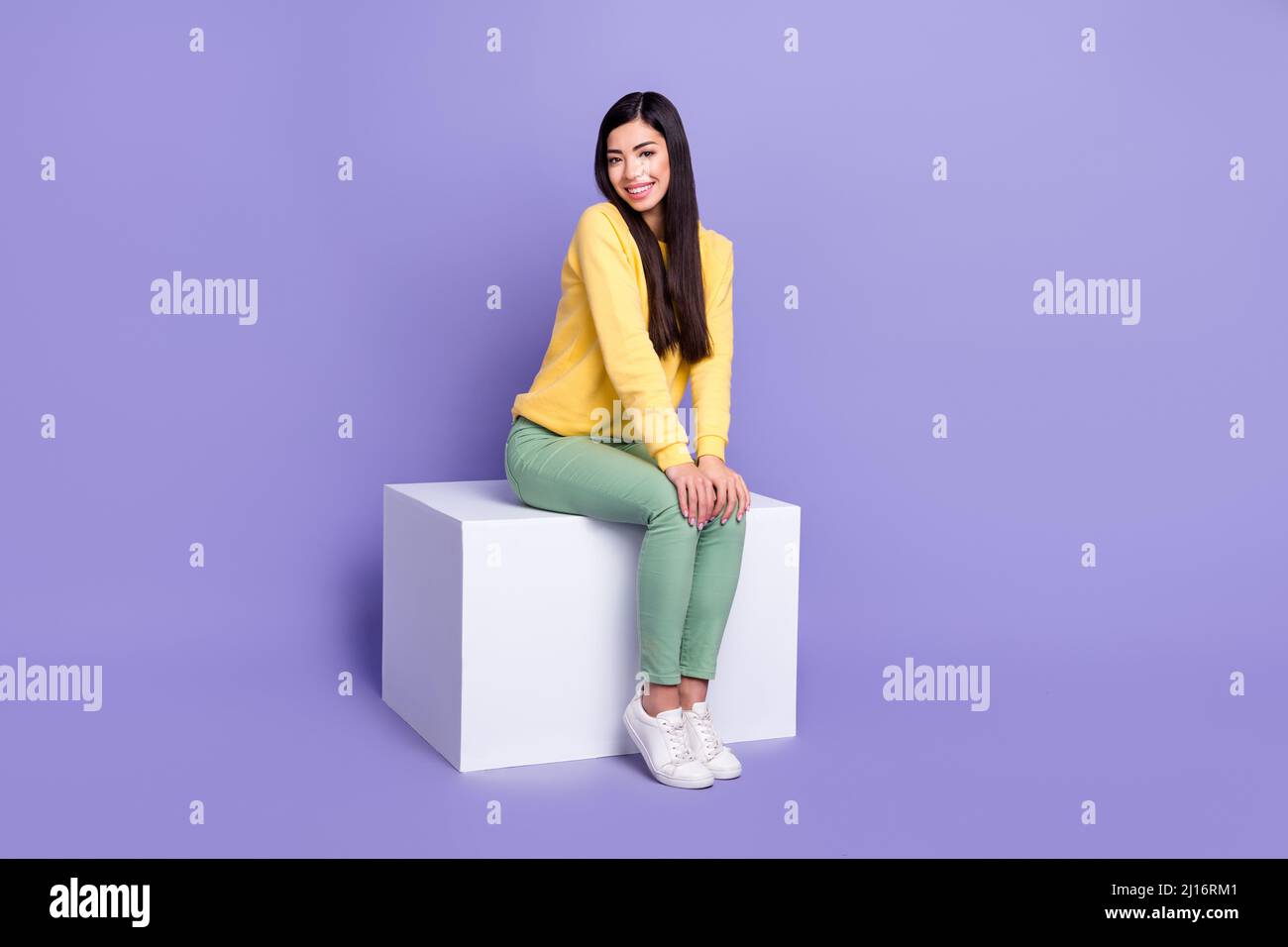 Full length photo of young cheerful girl sit platform promoter wear ...