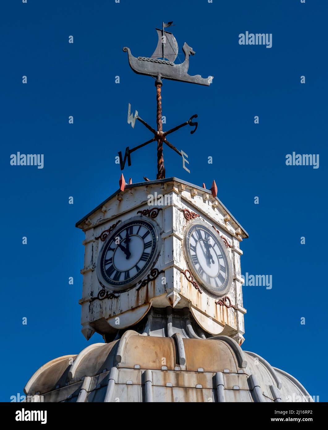 A view of a ship weather vane on the clock tower near Viking Bay Beach ...