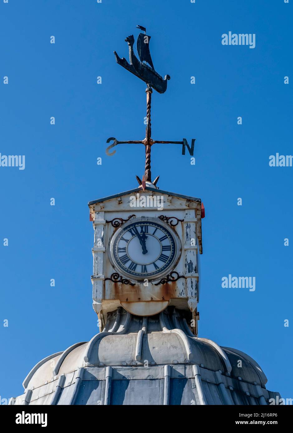 A view of a ship weather vane on the clock tower near Viking Bay Beach ...
