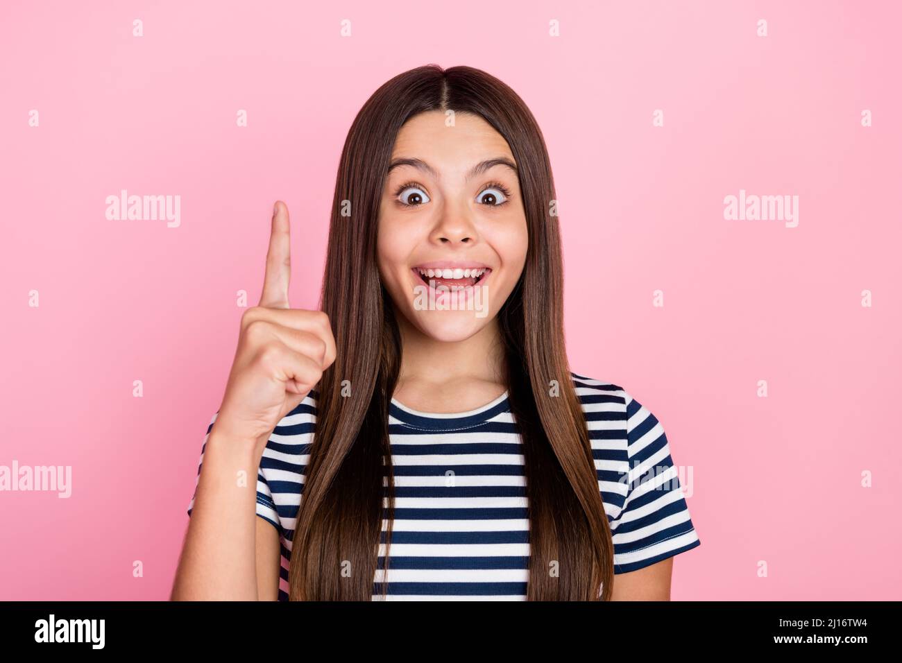 Photo of smart clever girl wear striped outfit pointing finger empty ...