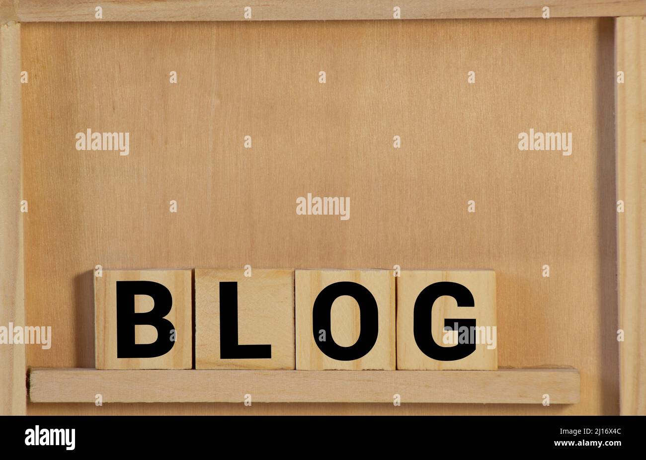 wood blocks with blog word on white background Stock Photo - Alamy