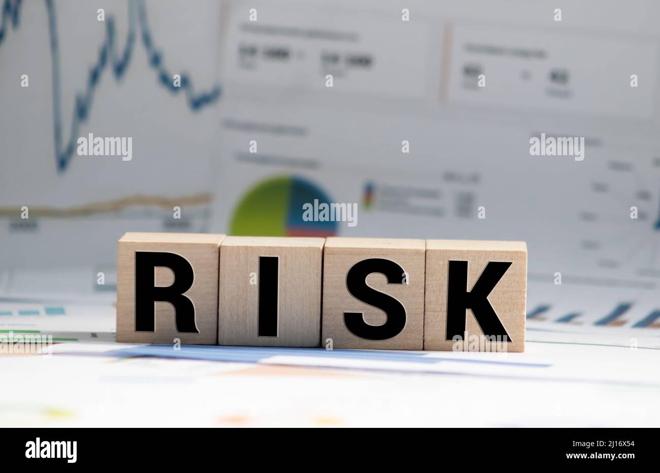 Risk Word On Blocks Arranged Behind The Ruler On Wooden Table Stock ...