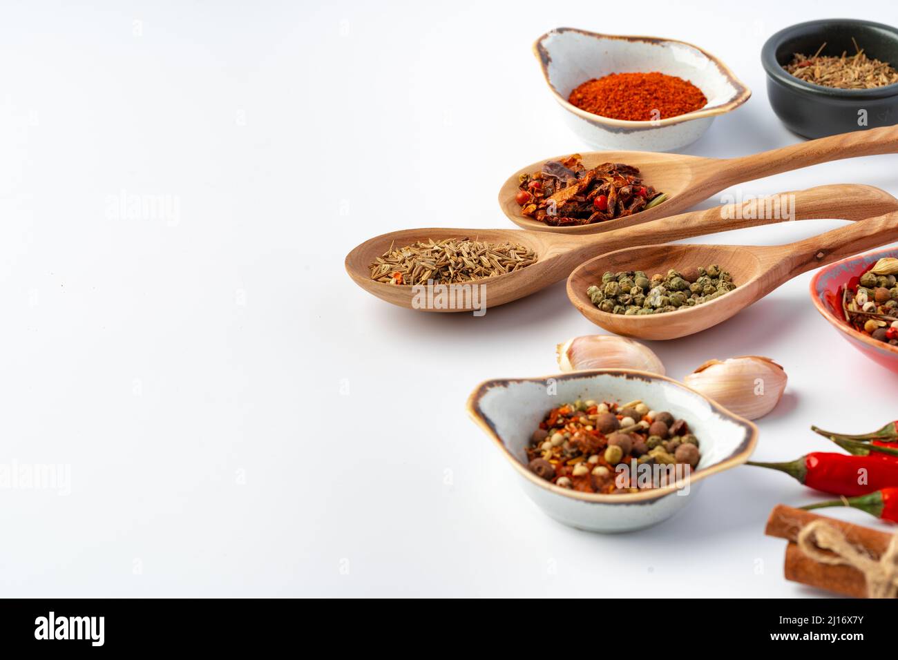 Variety of cooking spices on white background Stock Photo - Alamy