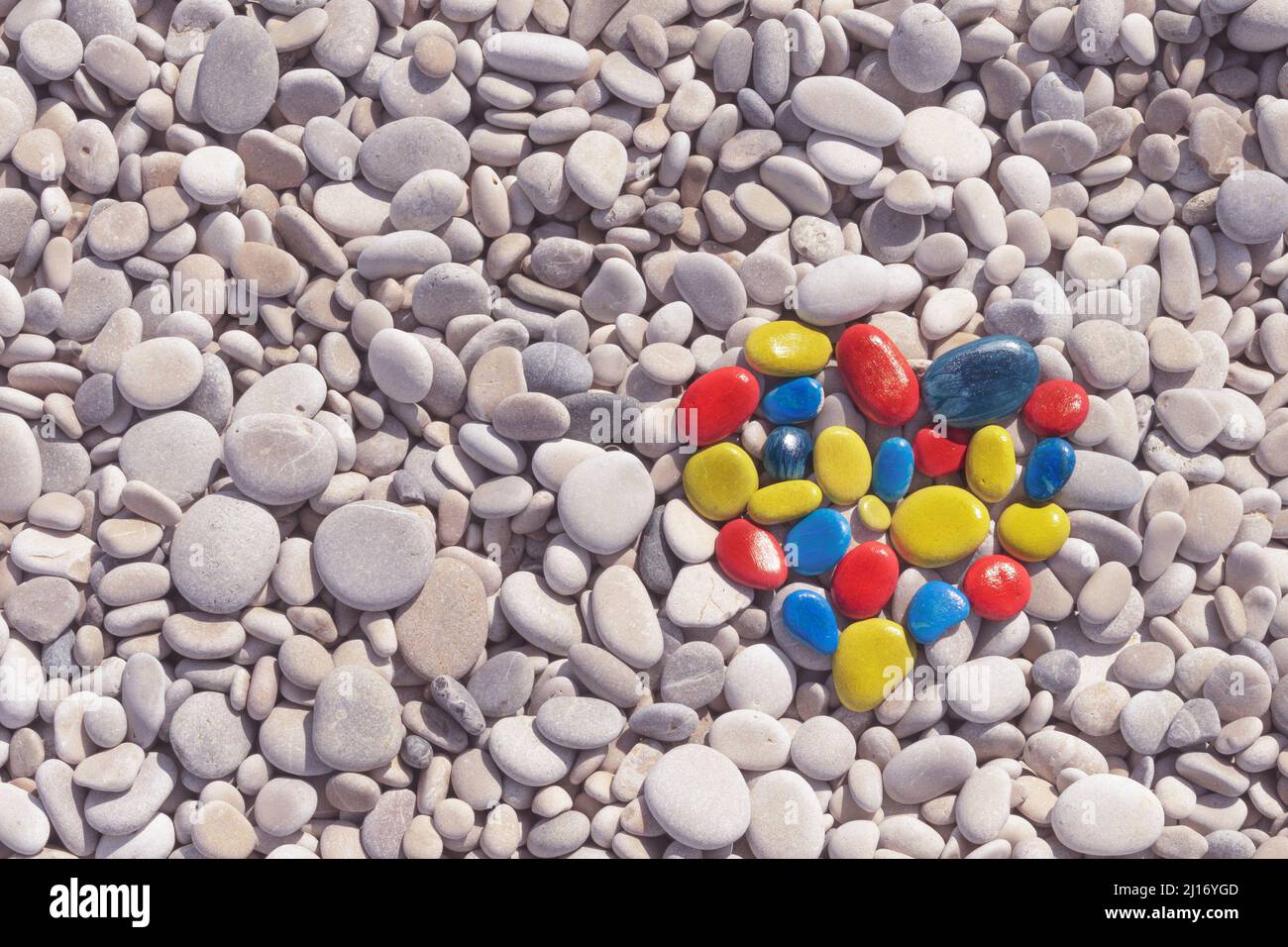World autism awareness day. Top view to white beach stones with ...