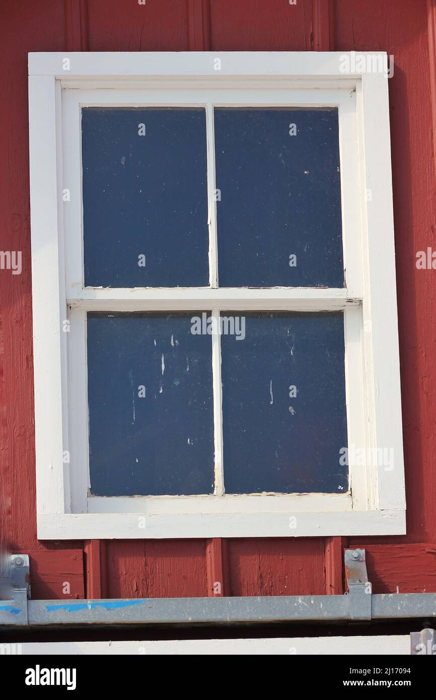 Bright red barn window with white painted frame Stock Photo - Alamy