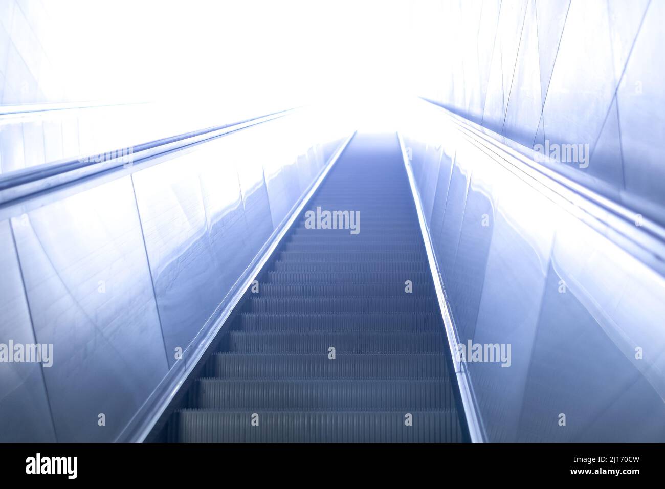 Escalator leading light hi-res stock photography and images - Alamy
