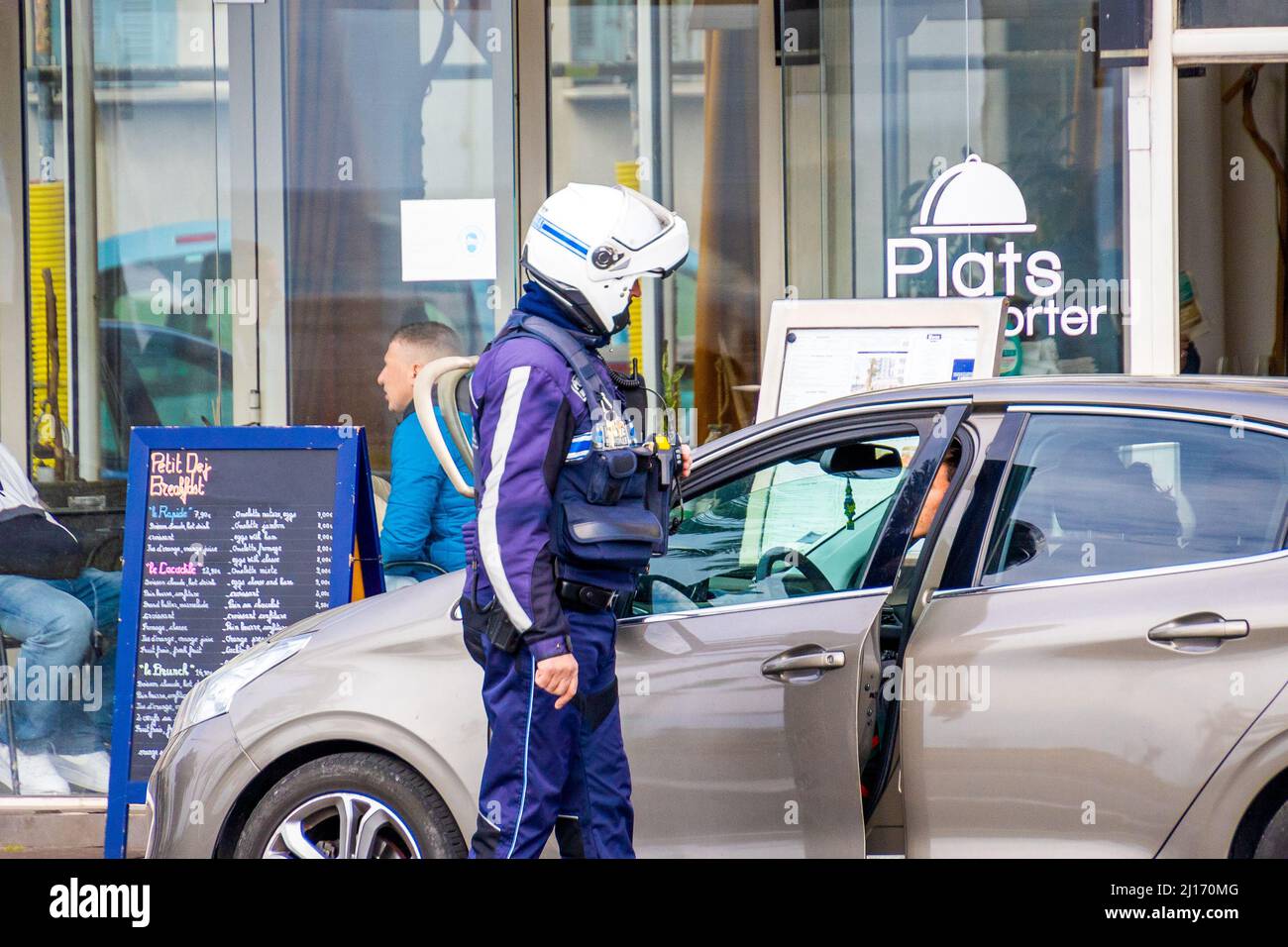 Police fining hi-res stock photography and images - Alamy