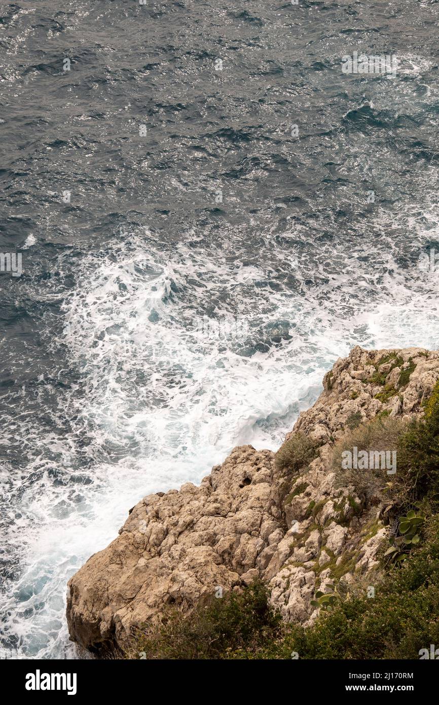wave crashing on a rock Stock Photo - Alamy