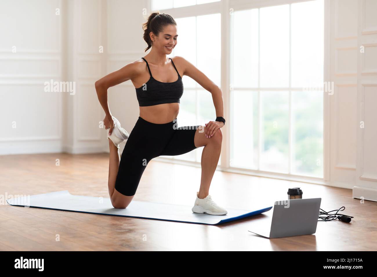 Woman stretching muscles using hi-res stock photography and images - Alamy