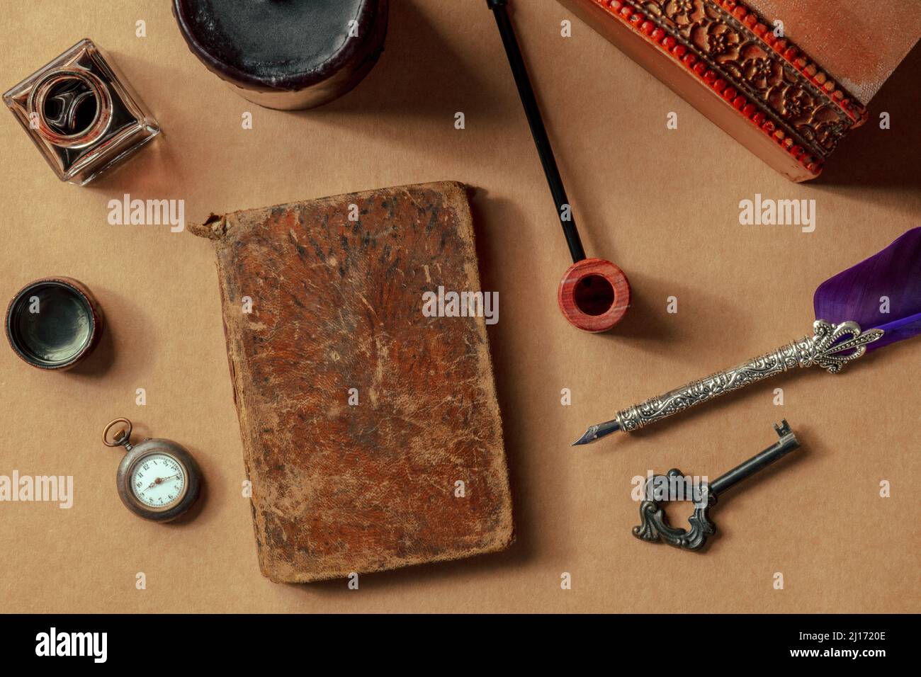 Vintage pipe, notebook, watch and key. Private detective investigation ...