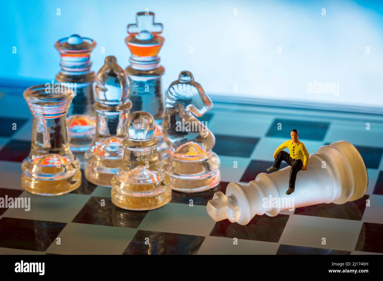 Glass chess pieces, king, queen, knight, bishop, rook and pawn. Fallen ...