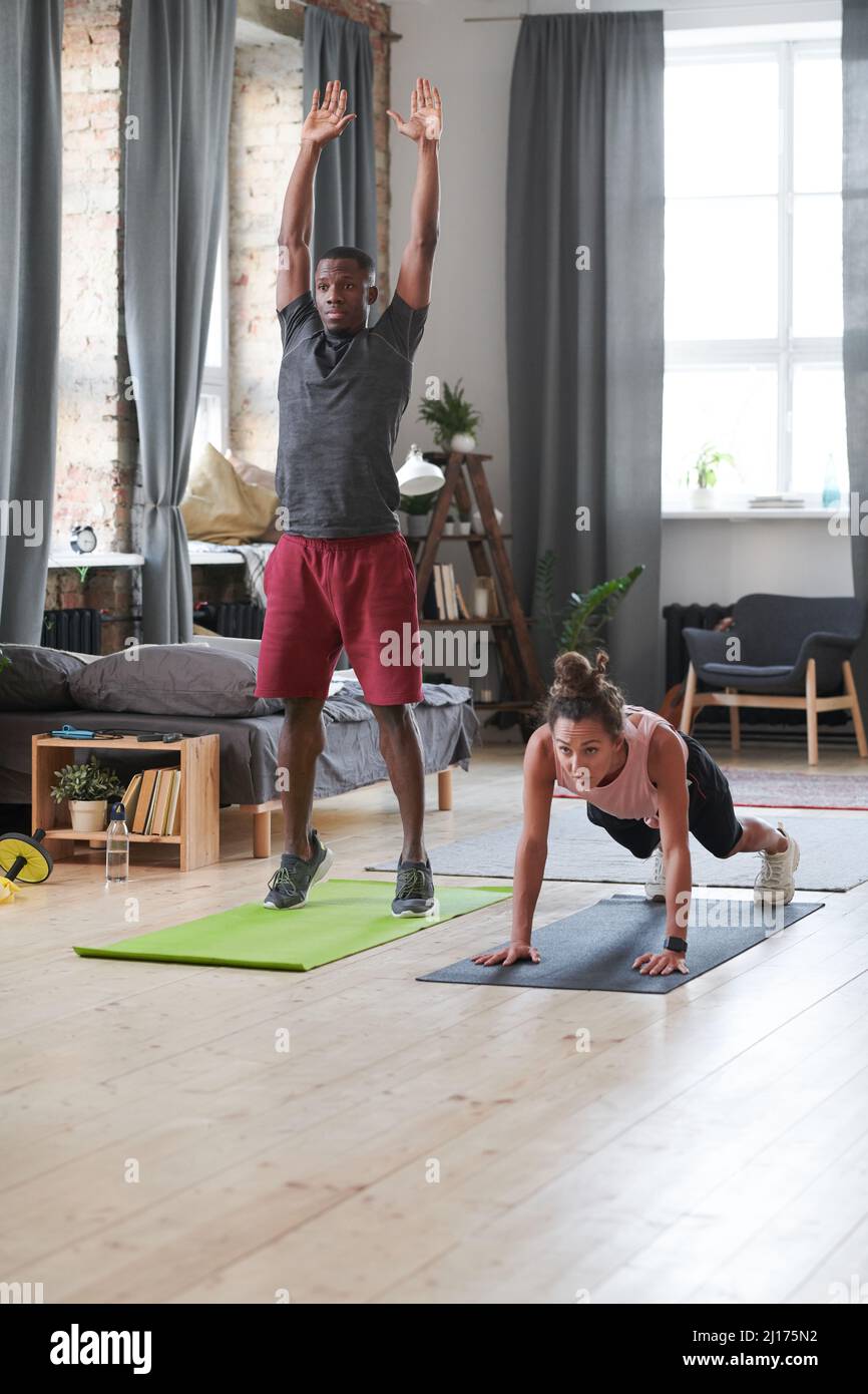 Burpees at home hi-res stock photography and images - Alamy