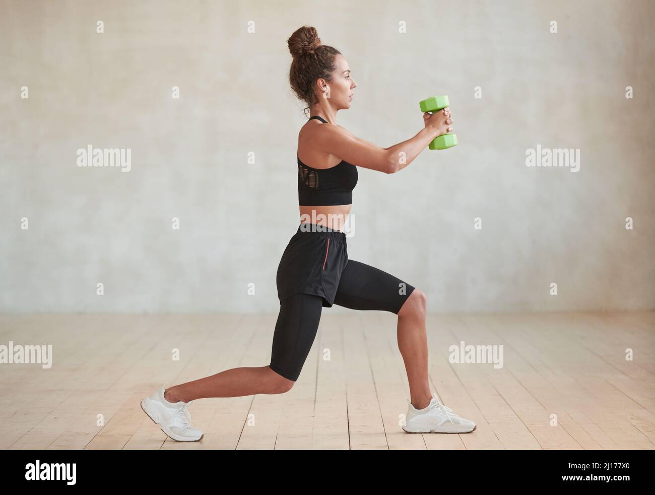 Horizontal full body side view shot of modern sporty yong adult ...