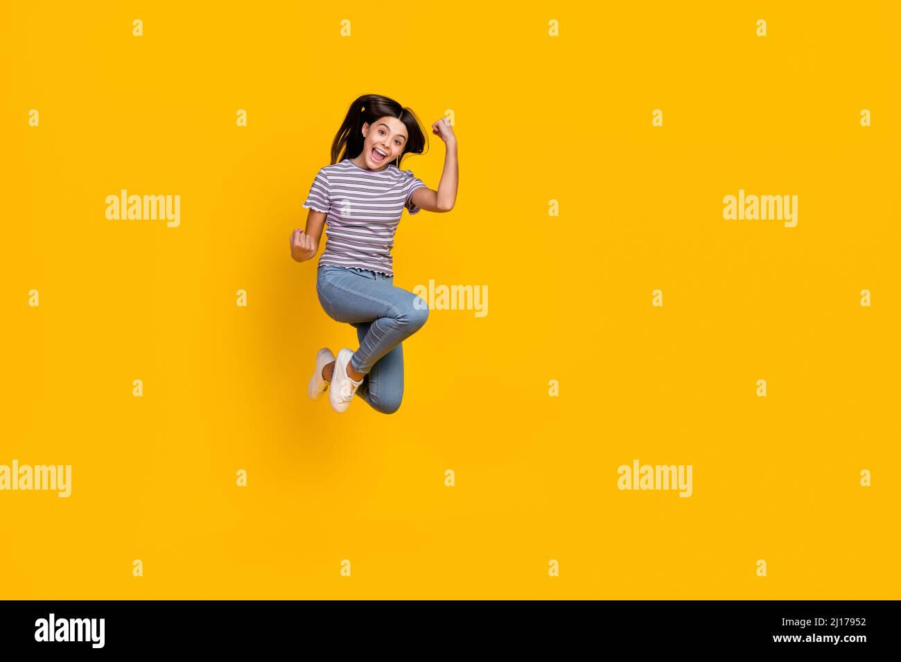 Full body photo of young cheerful girl celebrate luck fists hands ...
