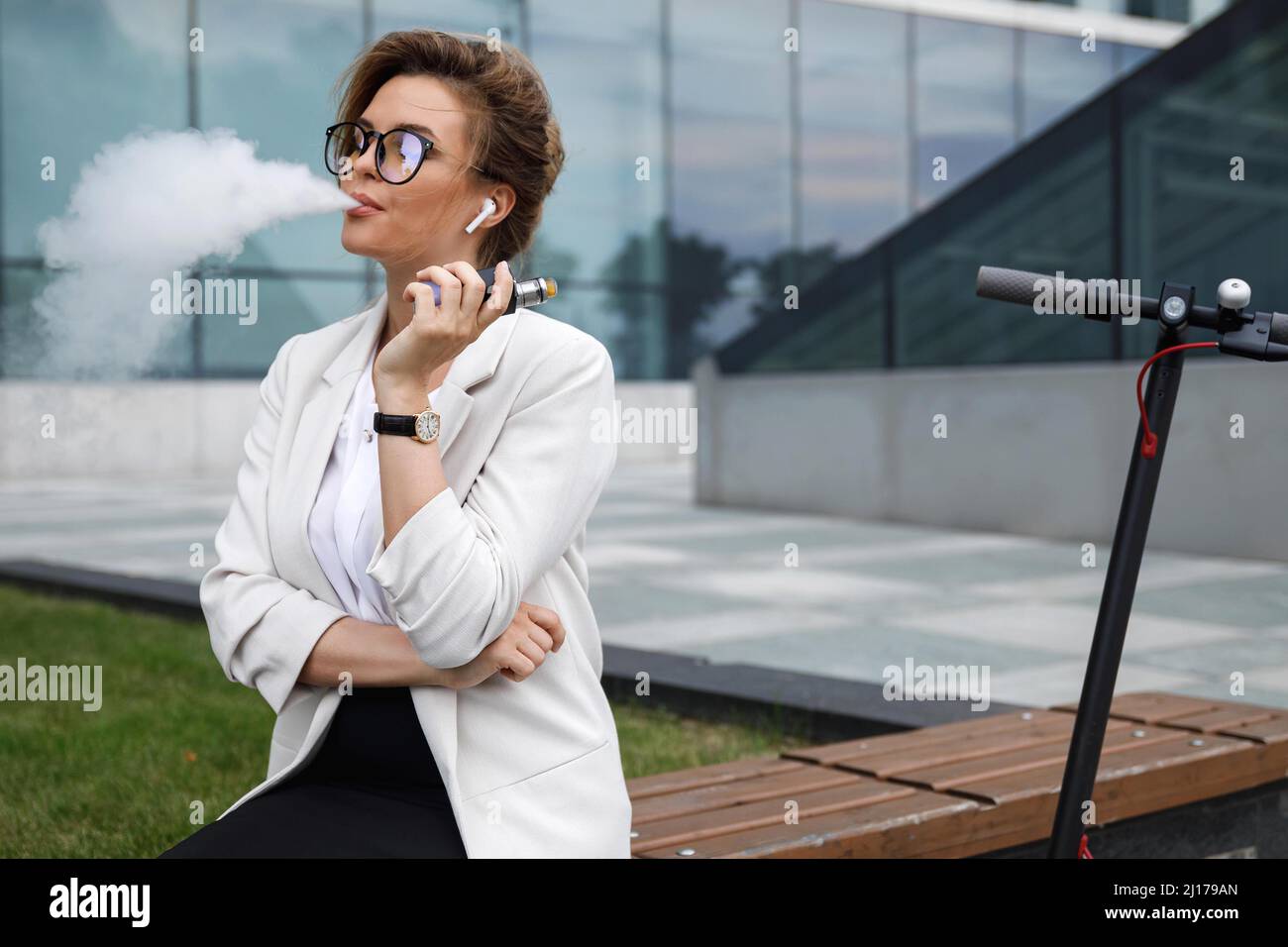 Smoking cigarette break office woman hi-res stock photography and ...