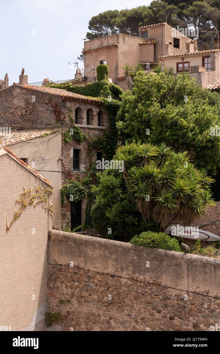 old private house in tossa de mar with a patio with trees Stock Photo ...