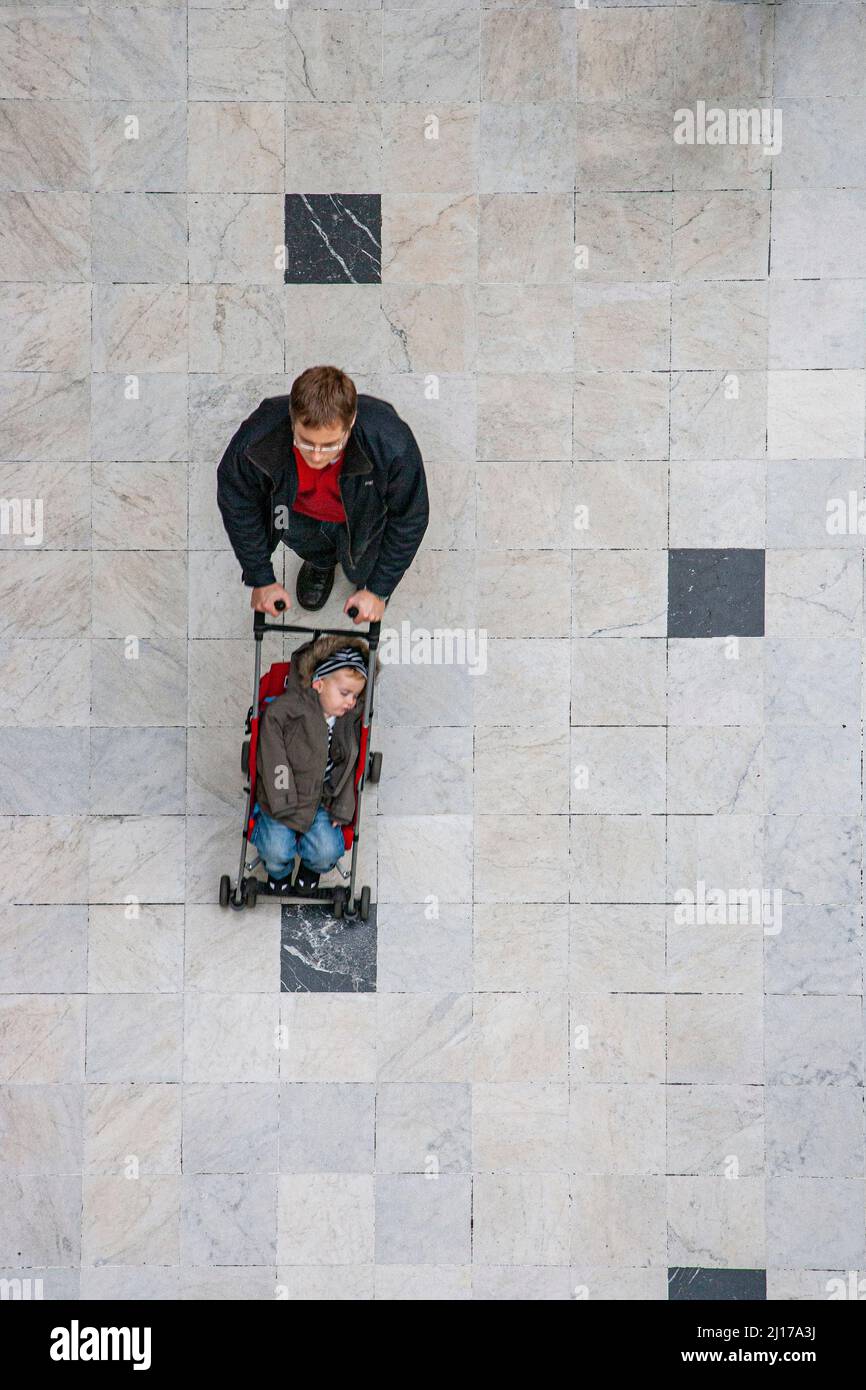 Pushing buggy hi-res stock photography and images - Alamy