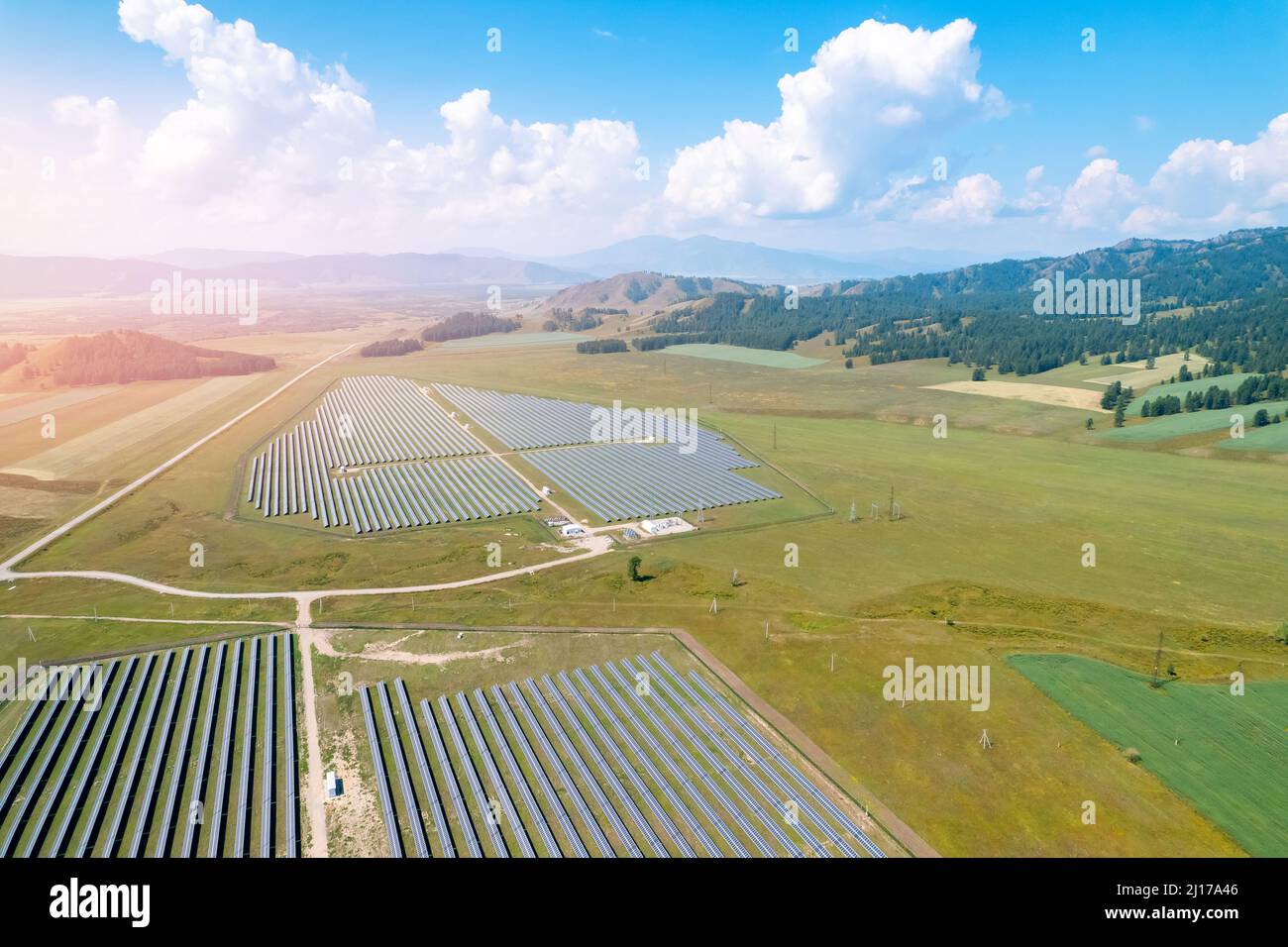 Aerial top view of solar panels on sunny day, power farm Altai Russia ...