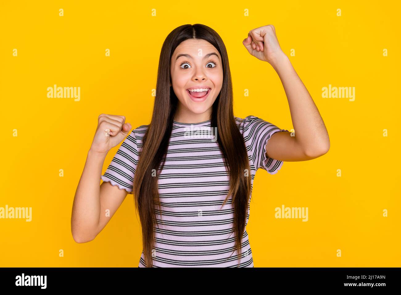 Portrait of attractive crazy funny lucky cheerful girl rejoicing ...