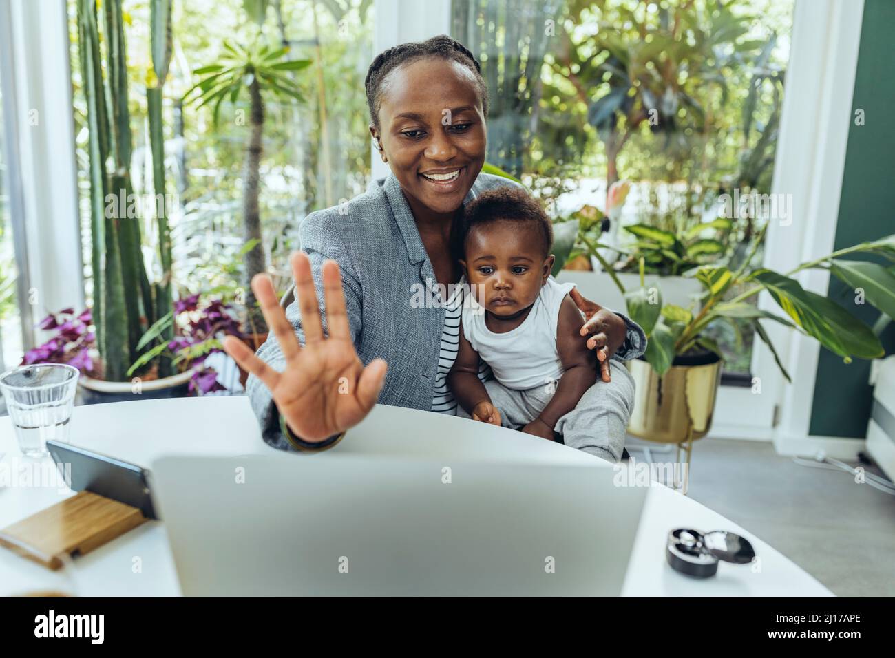 African ethnicity baby waving hi-res stock photography and images - Alamy