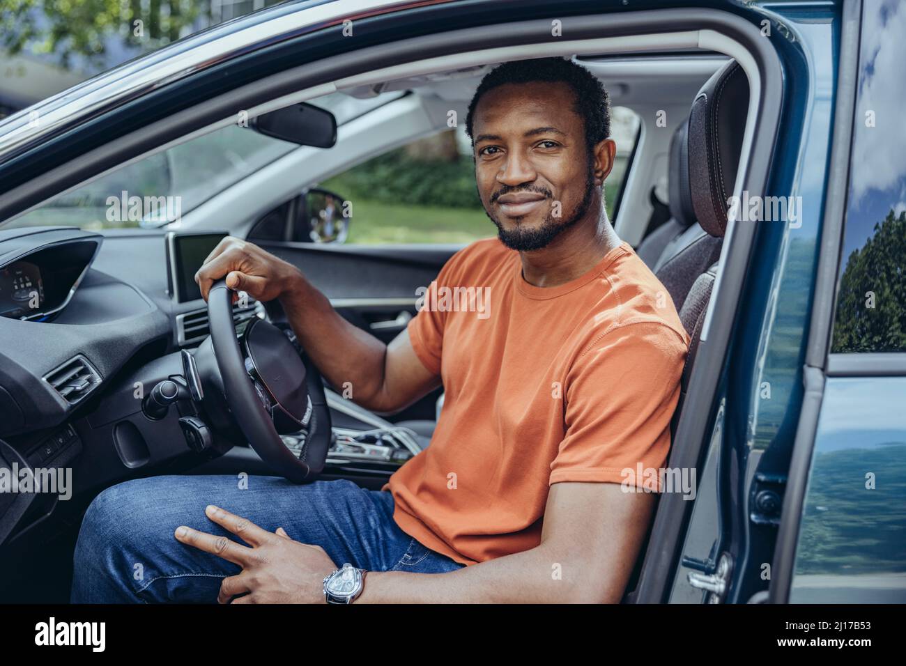 Portrait man sitting drivers seat hi-res stock photography and images ...