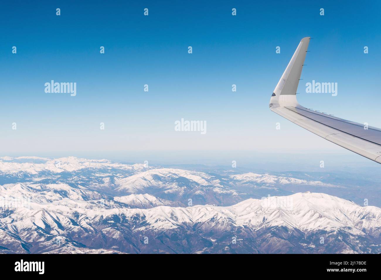 Airplane snowcapped mountains hi-res stock photography and images - Alamy