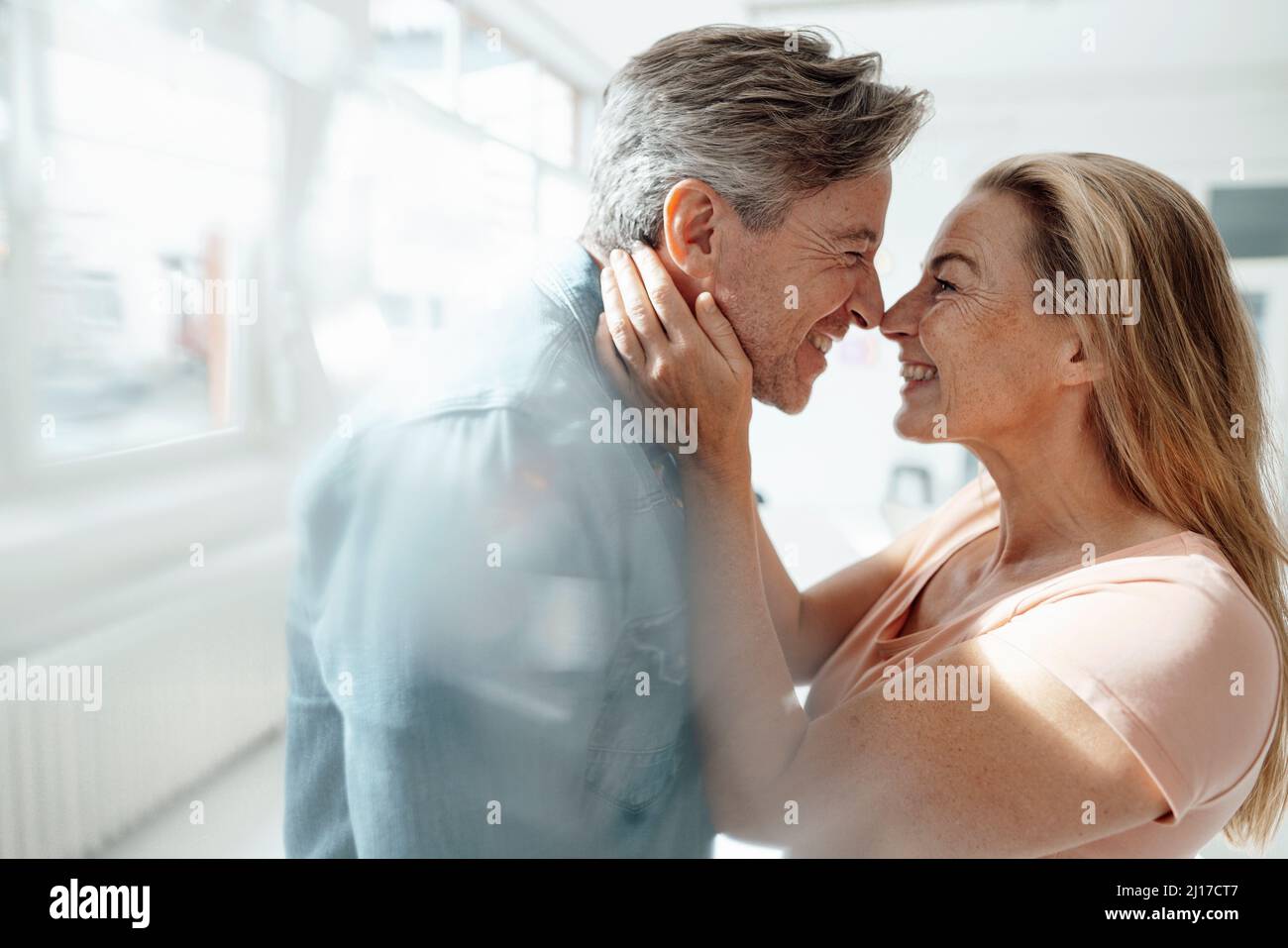 Man touching woman nose hi-res stock photography and images - Alamy
